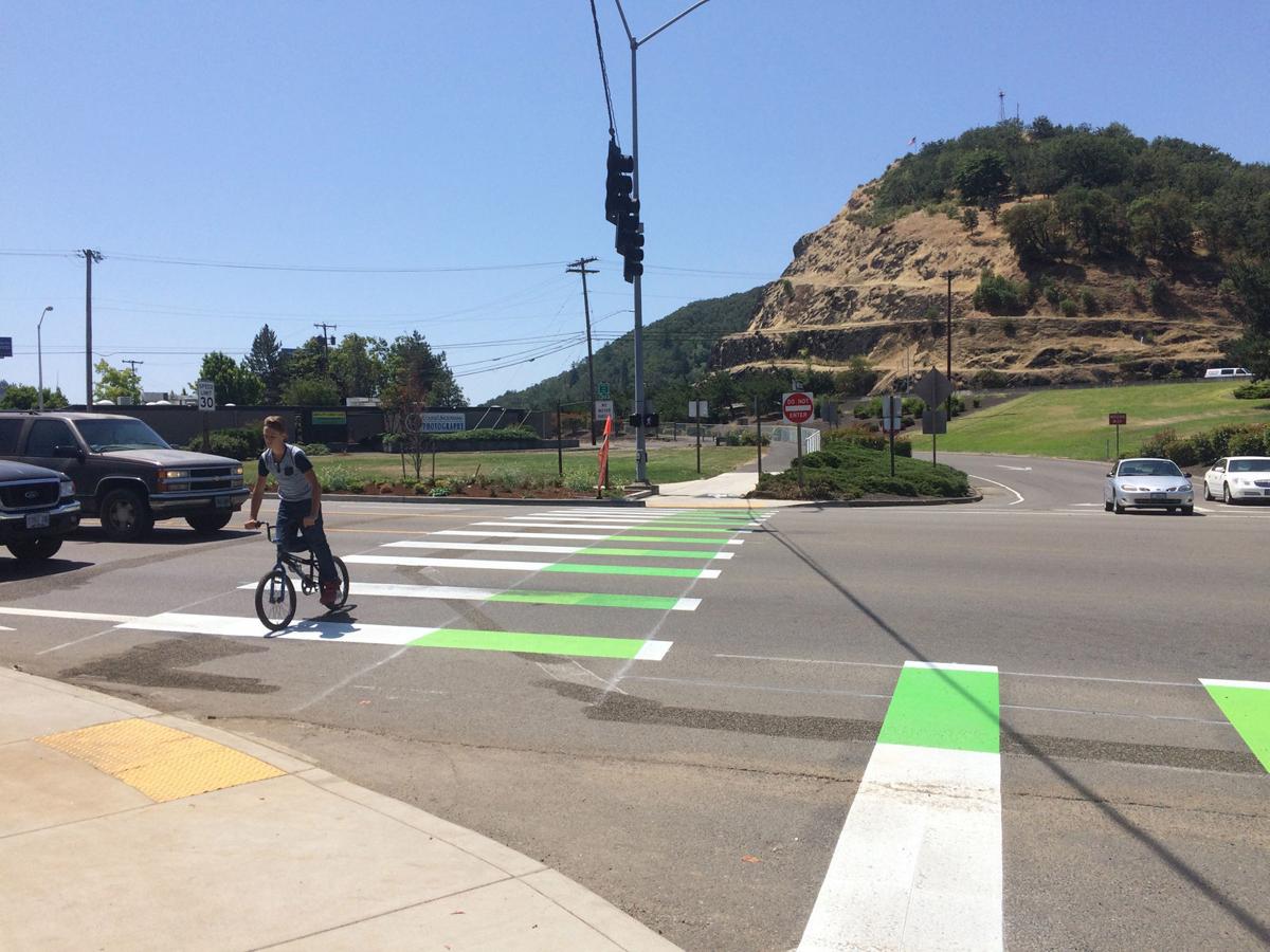 Mysterious green crosswalks connect multi-use paths | Traffic | nrtoday.com