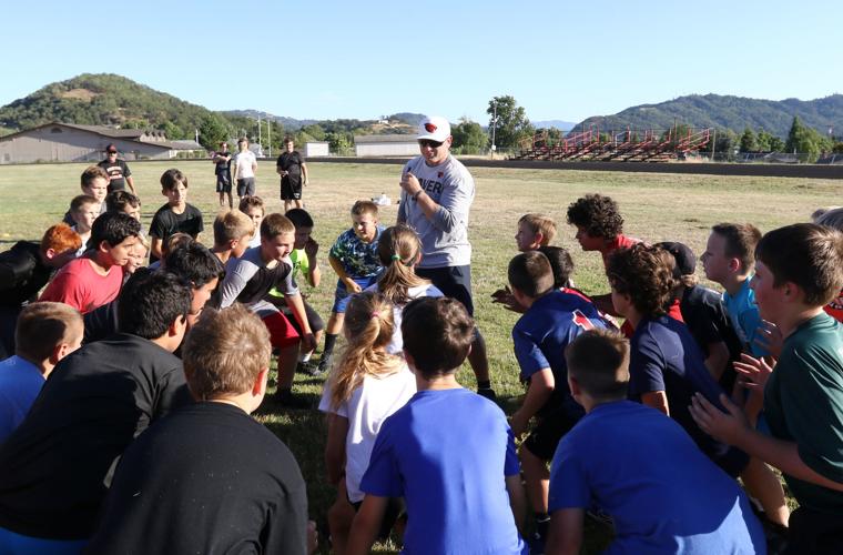 Larry Cookus Memorial Youth Football Camp a chance for his son to give ...