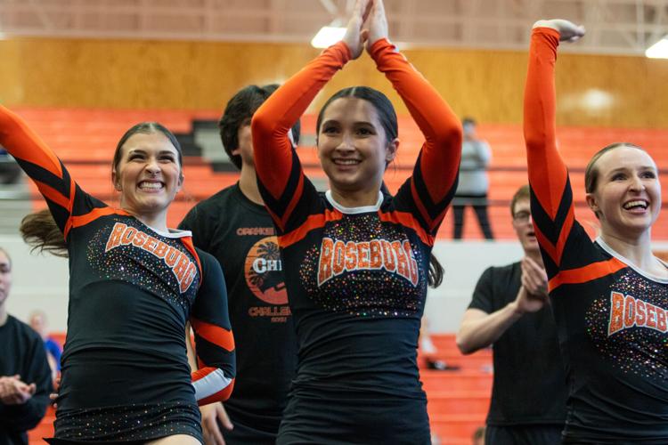 Tumbling, cheering and dancing through the Orange and Black Cheer ...