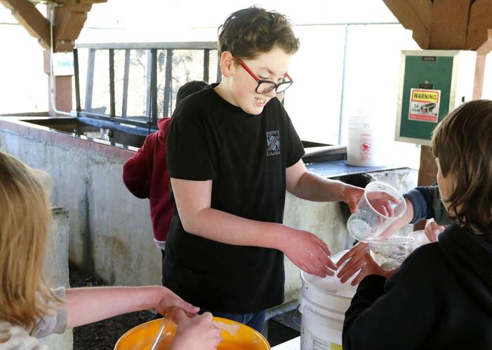 Eastwood Elementary students release fish from hatchery into Deer Creek ...