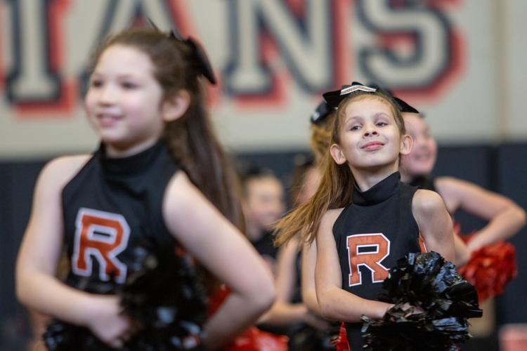 Tumbling, cheering and dancing through the Orange and Black Cheer ...