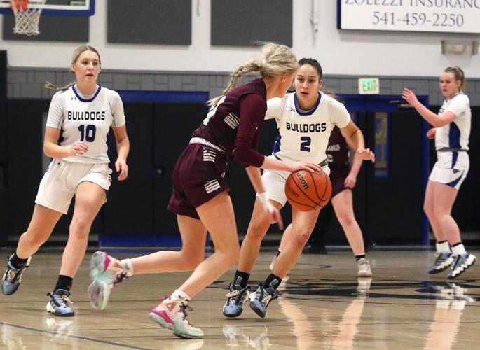 Sutherlin girls whip Douglas 57-36, cap off undefeated Far West season ...