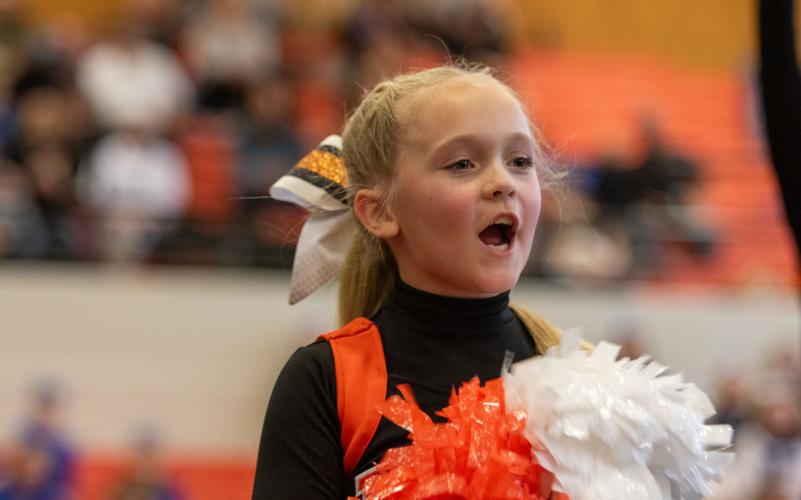 Tumbling, cheering and dancing through the Orange and Black Cheer ...