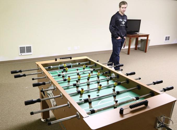 Student-athletes show people around their home at the Flegel Center ...