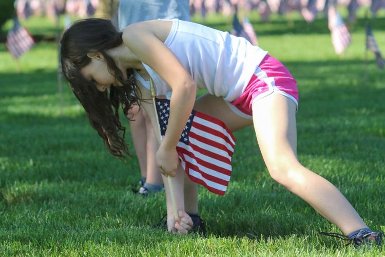 Fir Grove students plant flags to recognize veterans fro Memorial Day ...