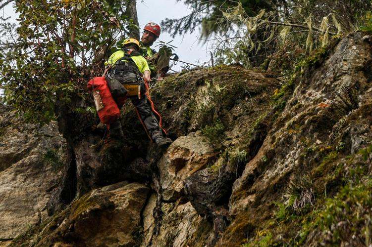 Rock Scalers check slide area for hazards | Local News | nrtoday.com