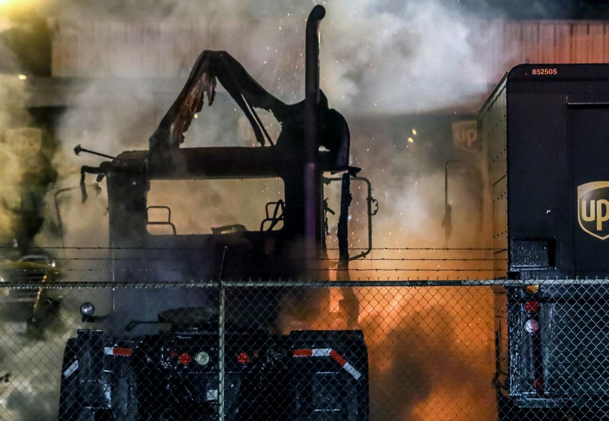 Fire heavily damages two UPS semitrailer cabs in Green | Public Safety ...