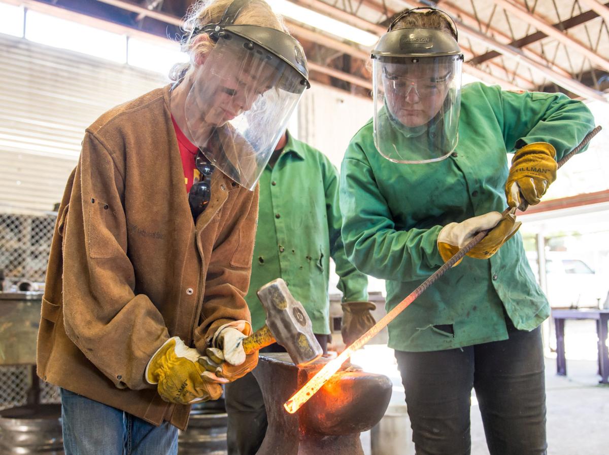 Middle school students learn welding at Douglas High School technology ...