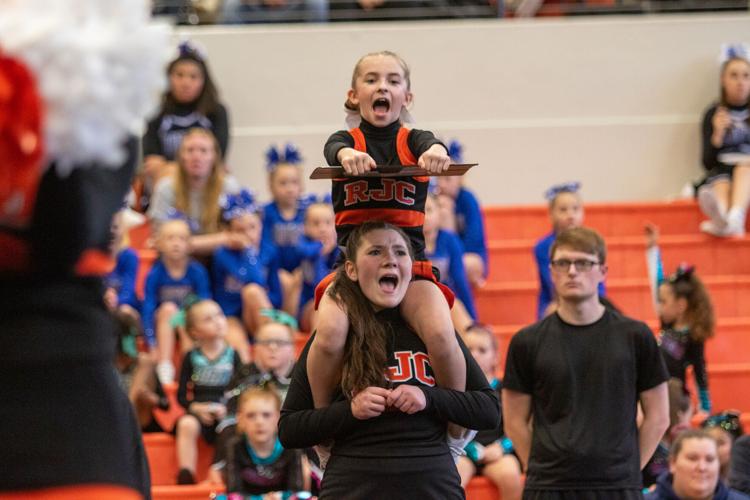 Tumbling, cheering and dancing through the Orange and Black Cheer ...