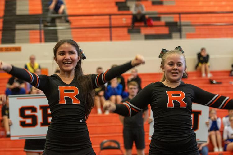 Tumbling, cheering and dancing through the Orange and Black Cheer ...