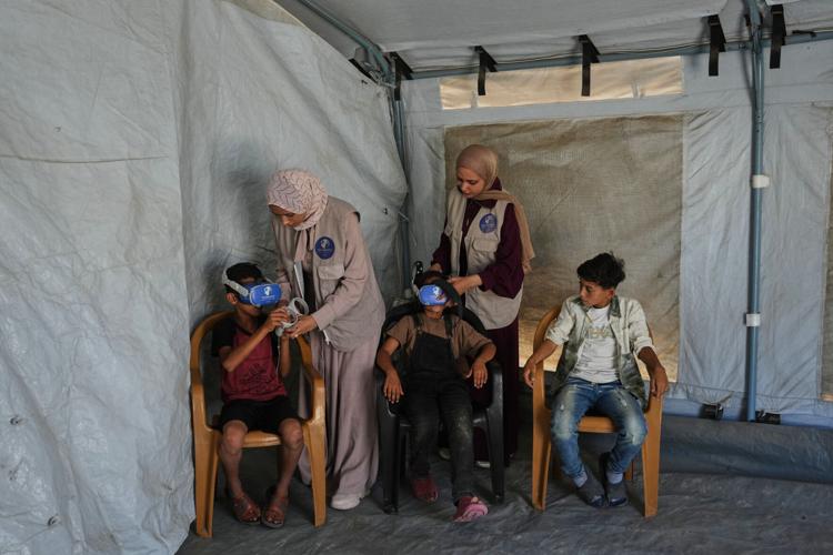 Photos of virtual reality sessions offering psychological support in ...