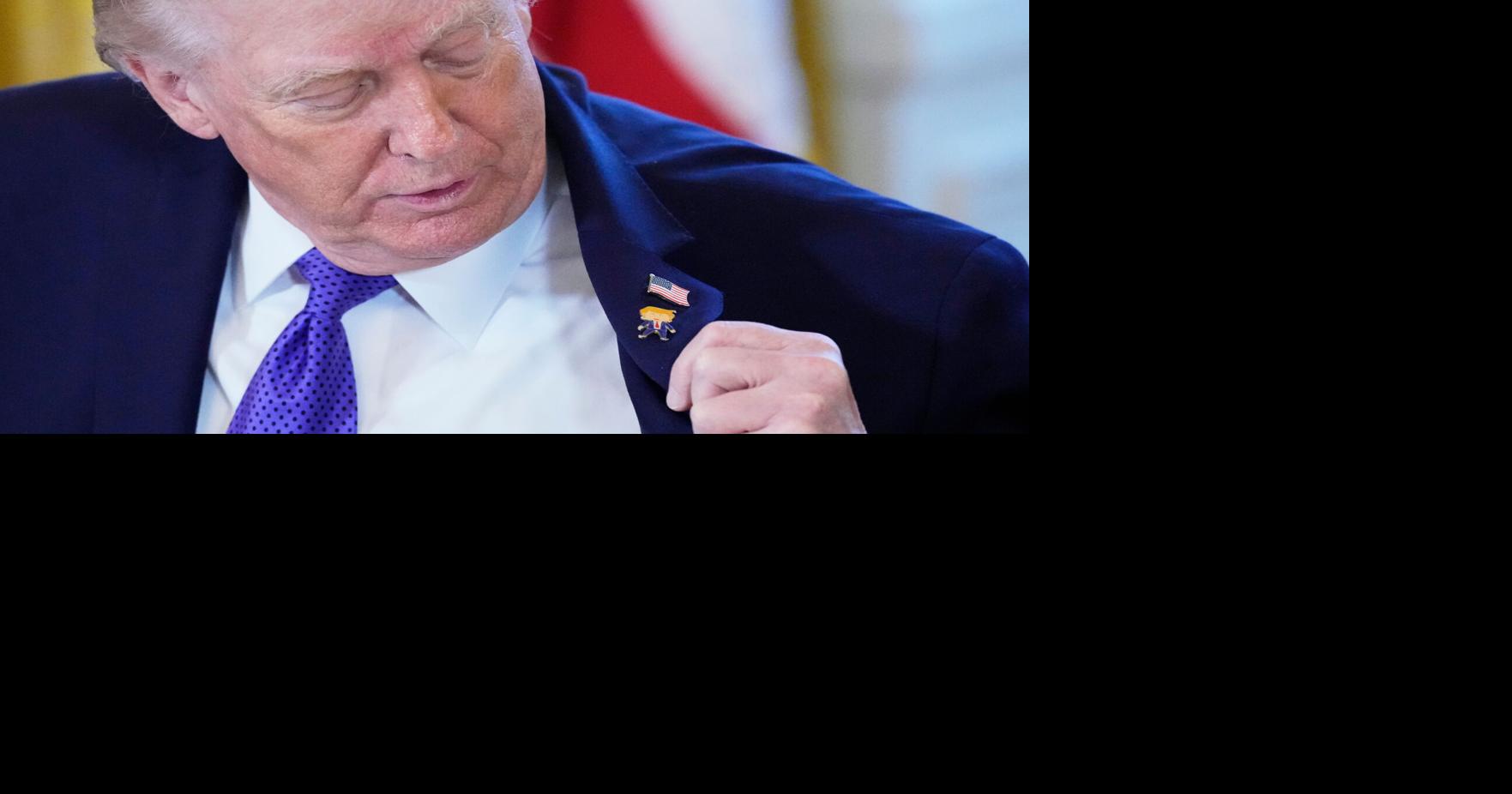 Trump wears a new 'Happy Trump' lapel pin, but insists he's never happy ...