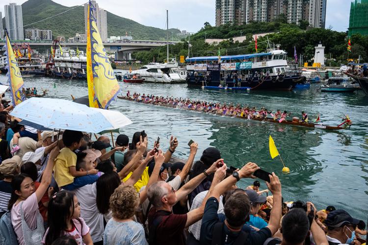Competitors take part in boat races to mark the Dragon Boat Festival ...
