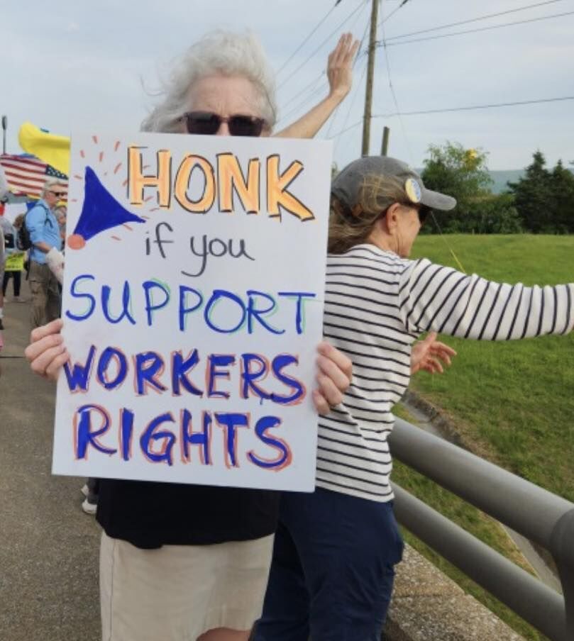 Hope Is the thing on the overpass: Protesters in Woodstock keep ...