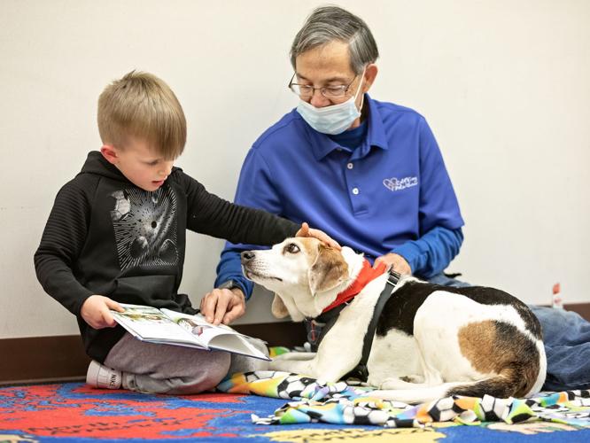 Reading with Riley: Certified therapy dog provides a listening ear to ...