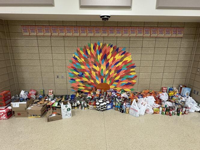 Shelves overflow with food drive competition | News | nwestiowa.com