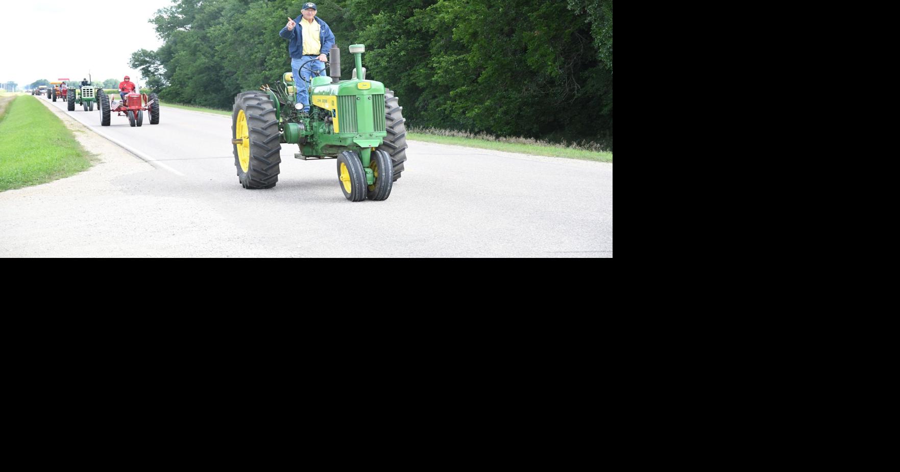 Annual antique tractor parade cruises through the Archer Co-op | News ...