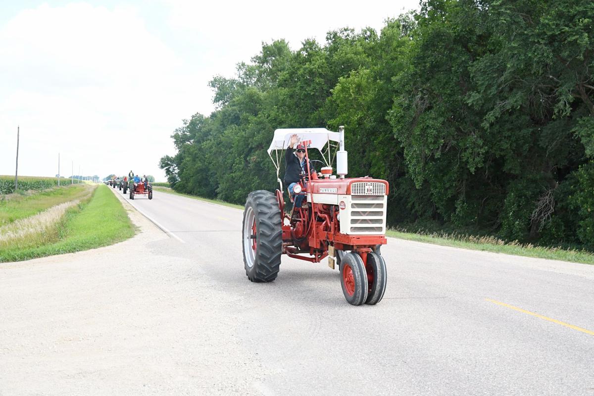 Annual antique tractor parade cruises through the Archer Co-op | News ...