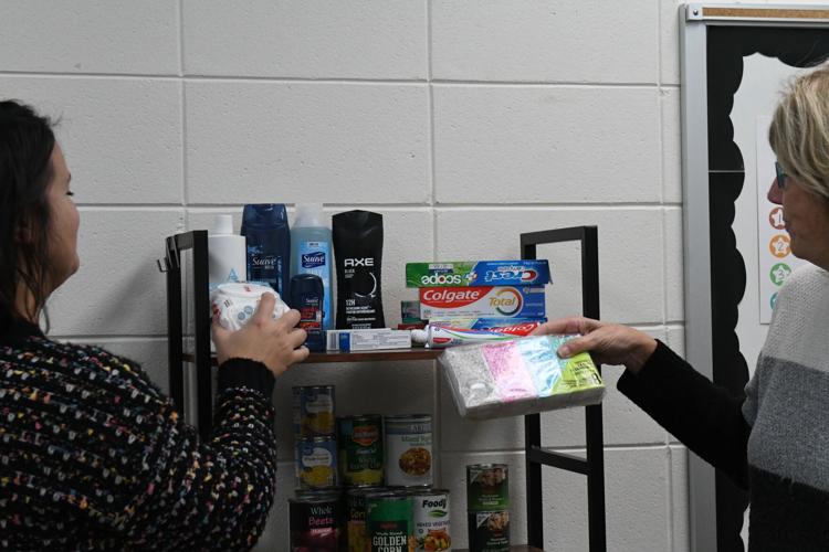 Shelves overflow with food drive competition | News | nwestiowa.com