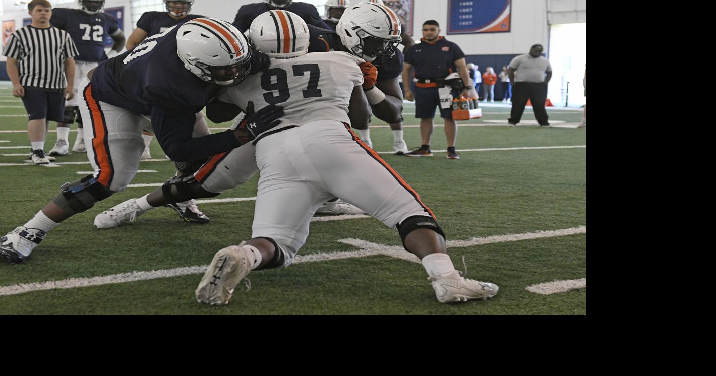 Right tackle battle between Calvin Ashley, Austin Troxell a ‘dead heat’