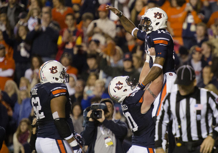 AUBURN FOOTBALL: Tigers thrive late in games with F.I.S.T. mentality