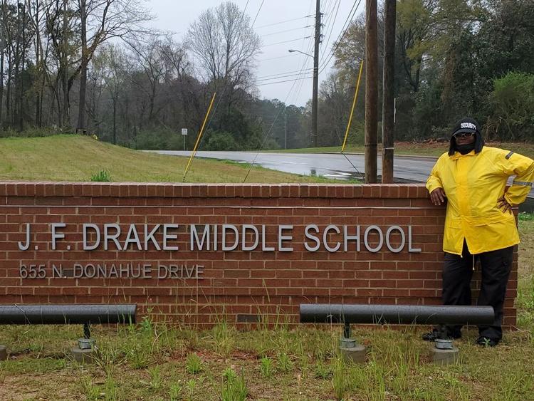 Drake Middle crossing guard lives by the motto 'To change the world ...
