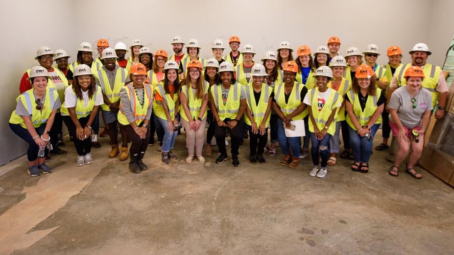 Opelika City Schools staff tours building of new sixth-grade Fox Run School