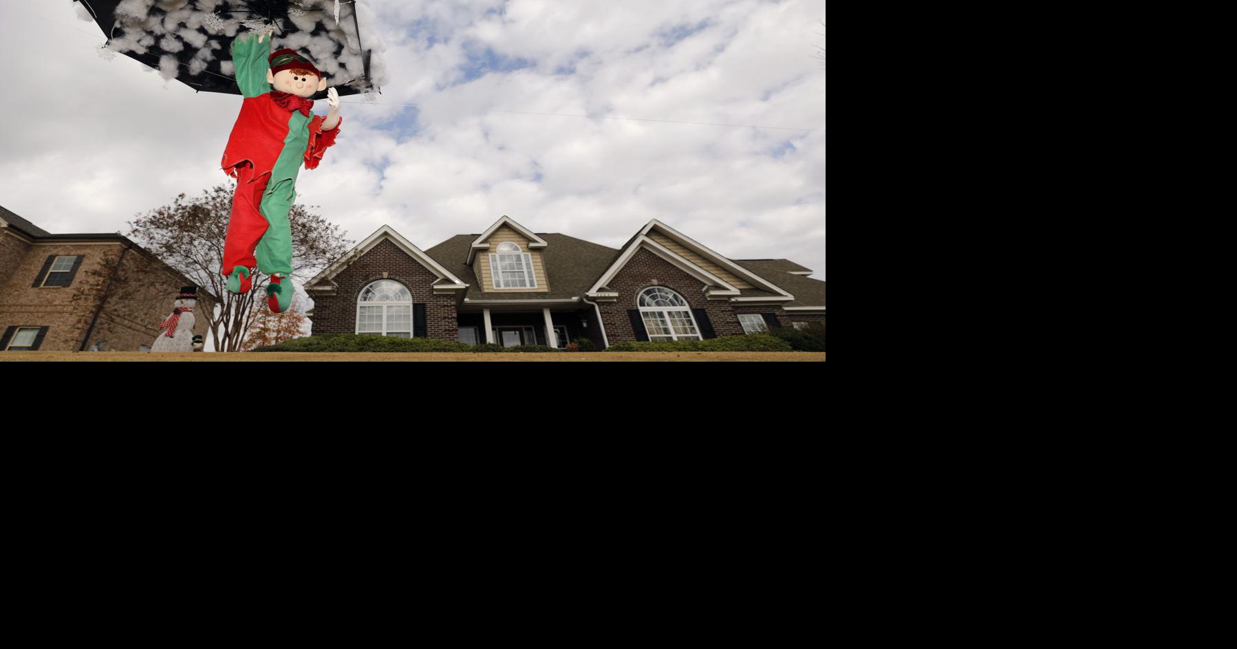 Elf brings excitement, Christmas spirit, stares to neighborhood