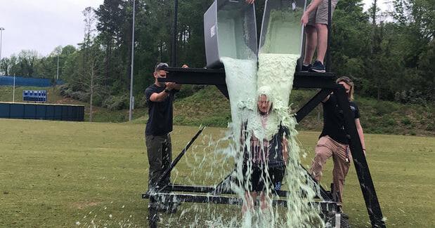 Auburn High students raise half a ton of food, celebrate by dumping ...