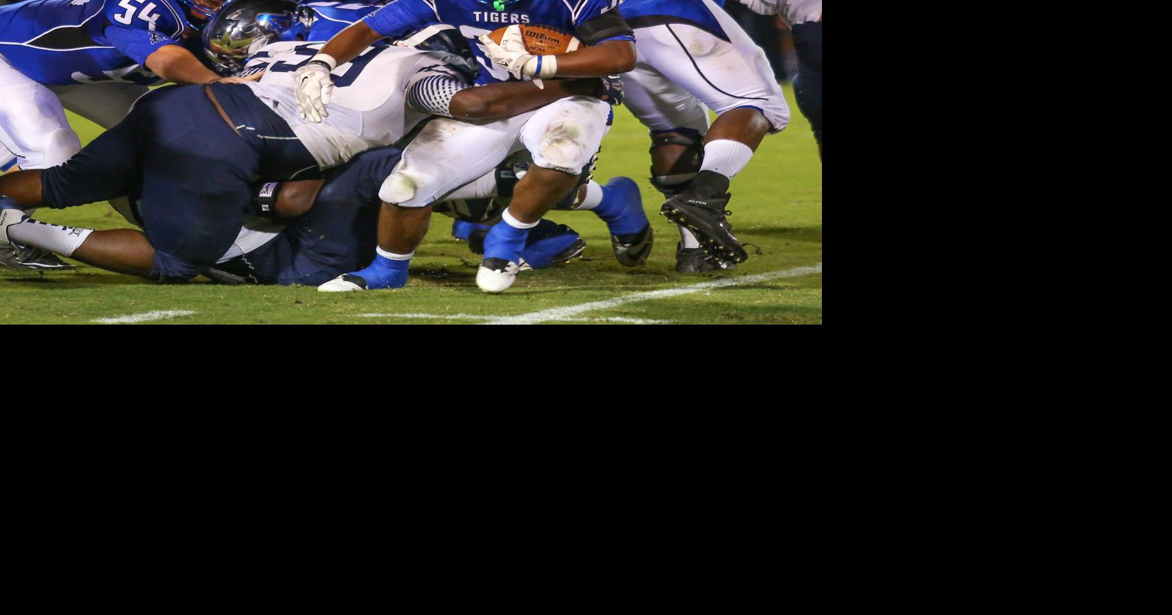 With new turf at Duck Samford Stadium, safety questions are asked