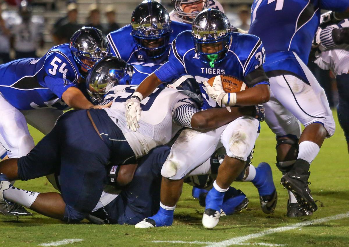 With new turf at Duck Samford Stadium, safety questions are asked