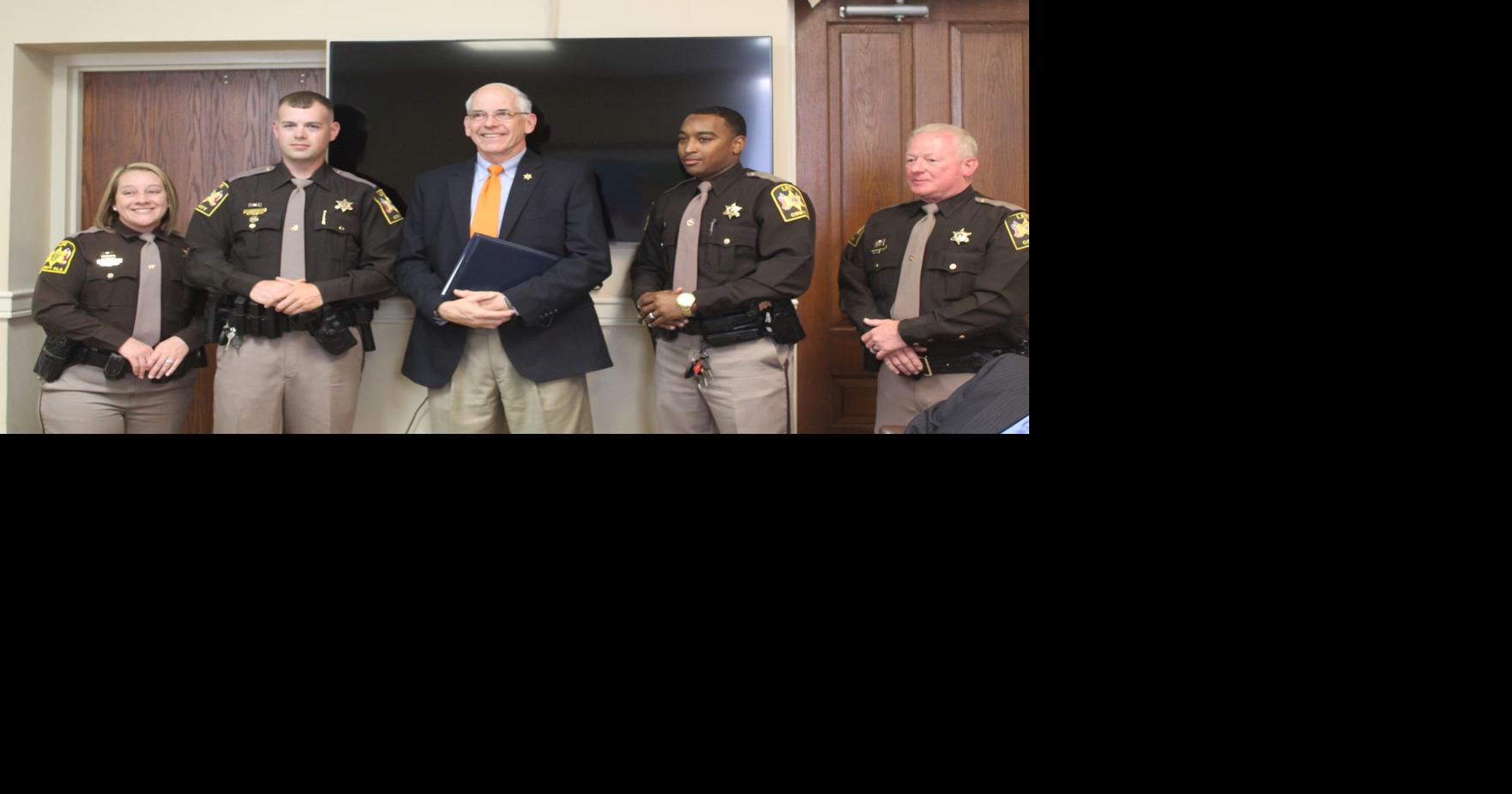 Lee County Commission recognizes four officers