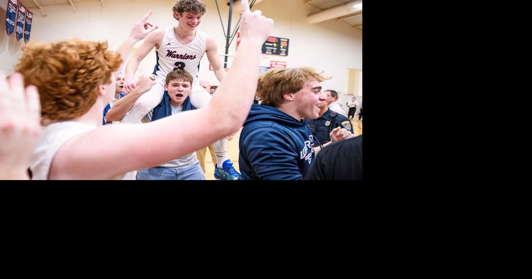 PHOTOS: Lee-Scott basketball splits with rival Glenwood