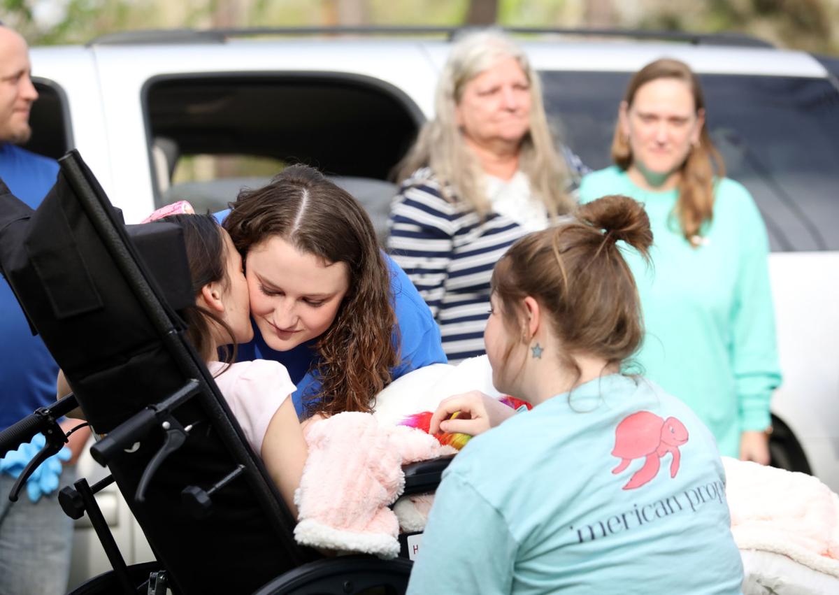'For the love of Kayla': Young tornado survivor returns home