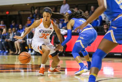 Energetic fourth-quarter scoring run lifts Cowgirls to win against ...