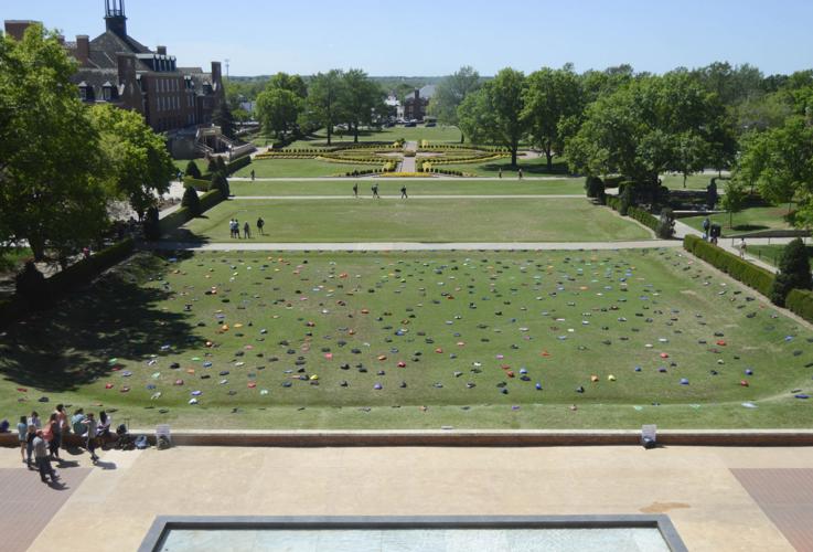 Photos: Alpha Phi Omega places more than 500 backpacks on Edmon Low ...