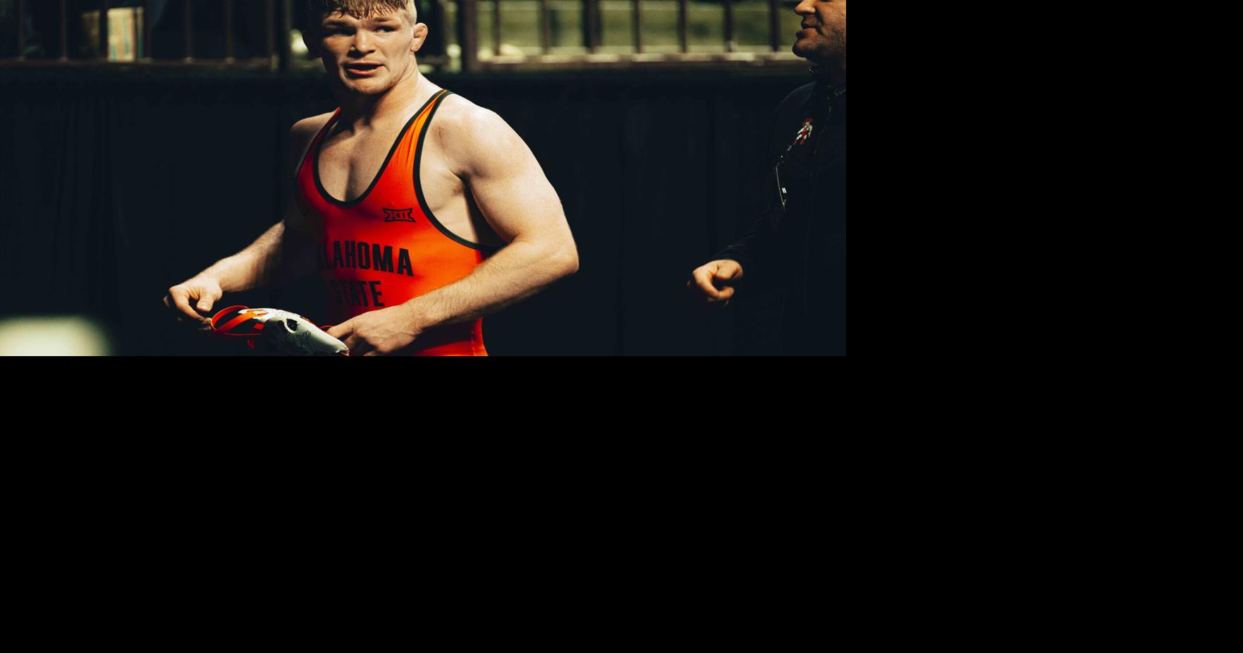 'Staying alive': Cowboys grind through day 1 of NCAA Wrestling ...