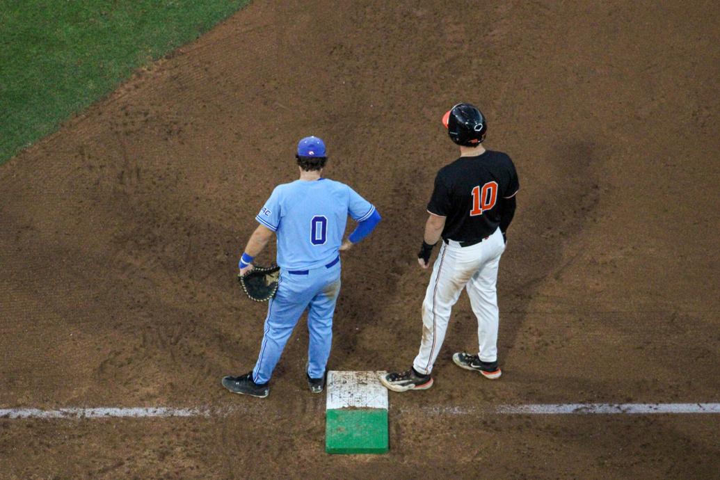 College baseball has a double bag at first base; why and what does it ...