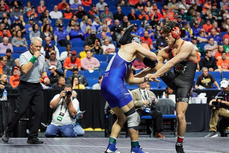 PHOTOS: Day 1 of Big 12 Wrestling Tournament | | ocolly.com