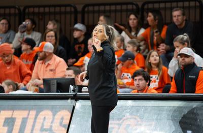 Oklahoma State uses second half run to defeat West Virginia 64-57 ...