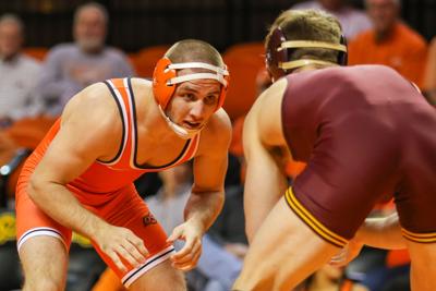 OSU starts Big 12 action with win, Heil tallies 100th victory | Sports ...