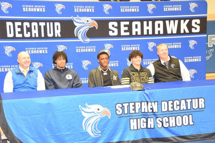 Three Decatur seniors commit to Division I football | | octodaydispatch.com
