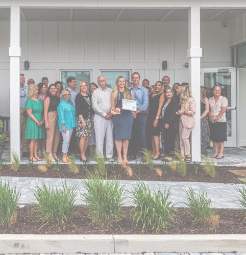 Harrison Group celebrates new 18th Street headquarters with ribbon ...