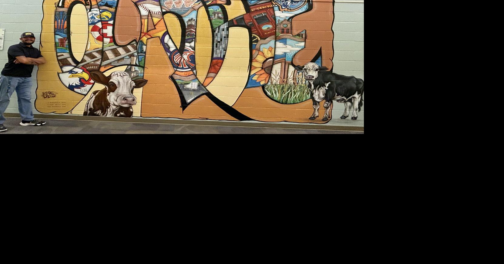 City unveils community center mural designed by local artist with ...