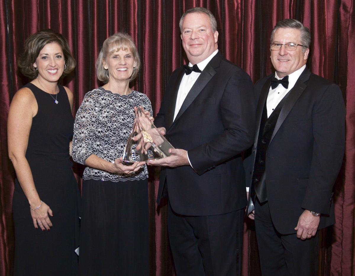 Burkes honored at MCF Ball