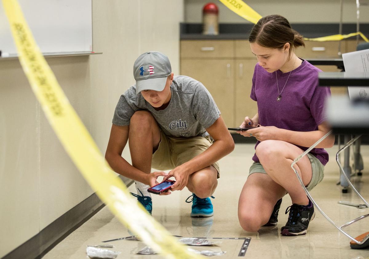 Omaha police's CSI demonstration gives students a look at life as a ...