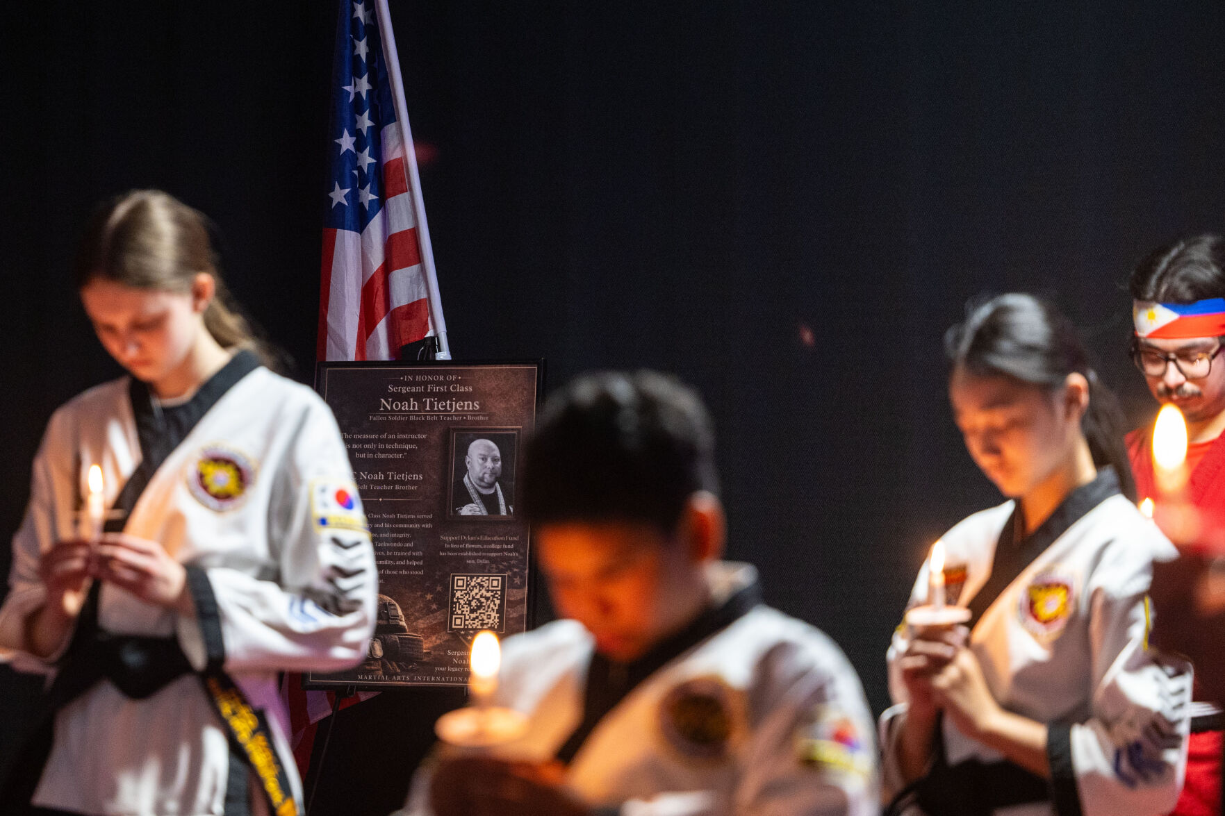 Photos: Martial Arts International holds candlelight mat ceremony for ...