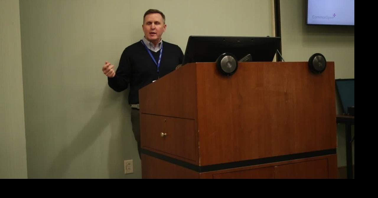 Steve Schieber, St. Francis president, speaking at Rotary Club