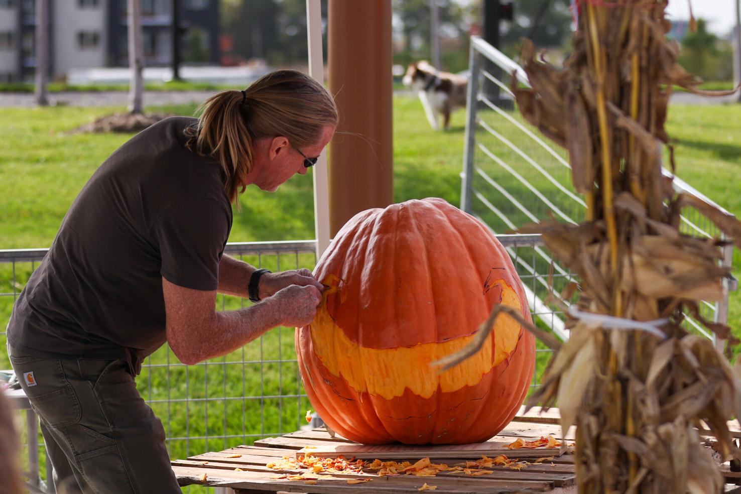Photos: Giant pumpkin carving comes to Omaha in inaugural Heartwood ...