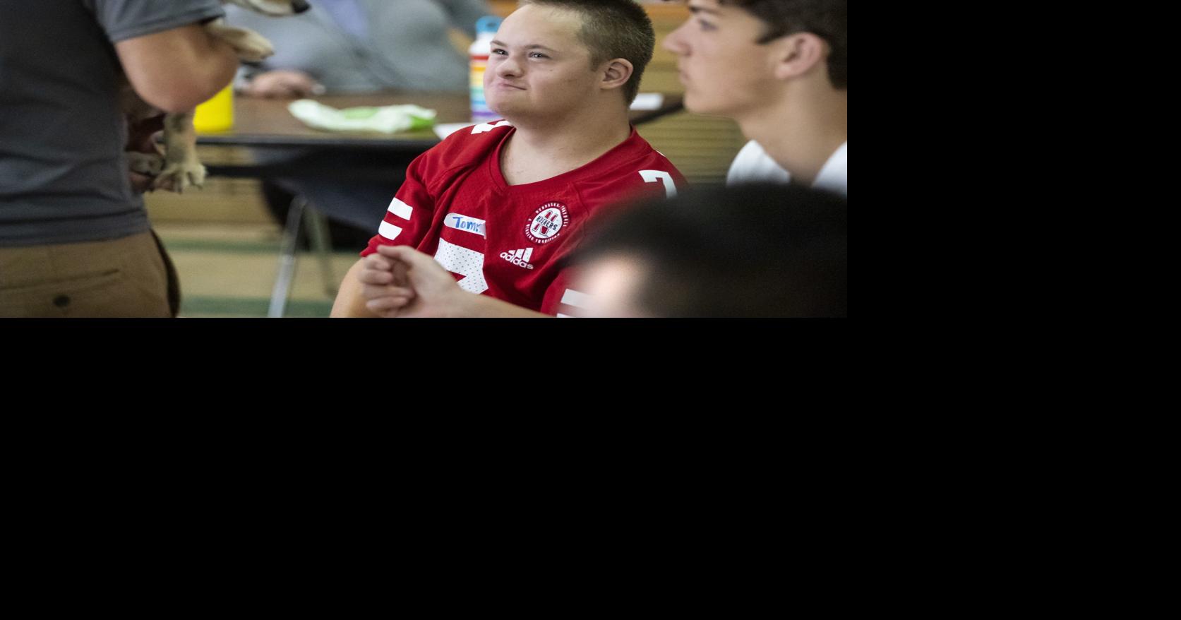 Kids with intellectual, developmental disabilities hold snakes, baby ...